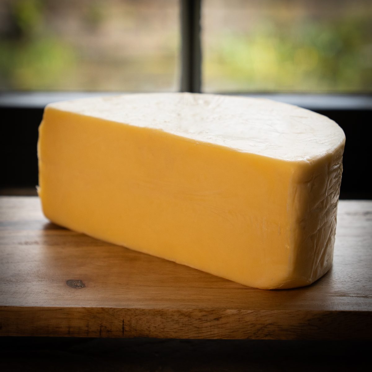 Traditional Derby Cheese Half Moon 1.4KG - Hartington Creamery